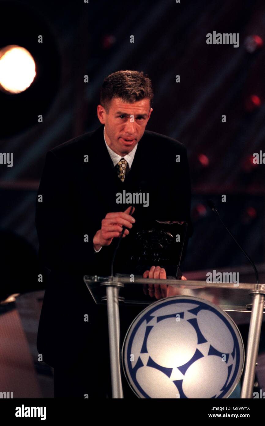 Slovenia's Coach Srecko Katanec receives the award for the Best Mover ...