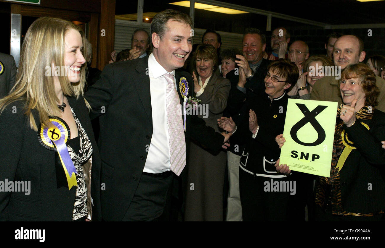 SNP candidate Richard Lochhead and wife Fiona arrive at the Elgin Town ...