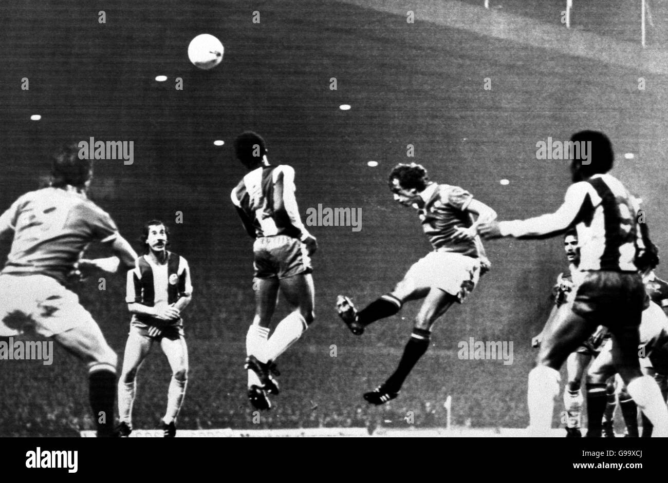Manchester United's Stewart Houston (second right) heads at goal only ...