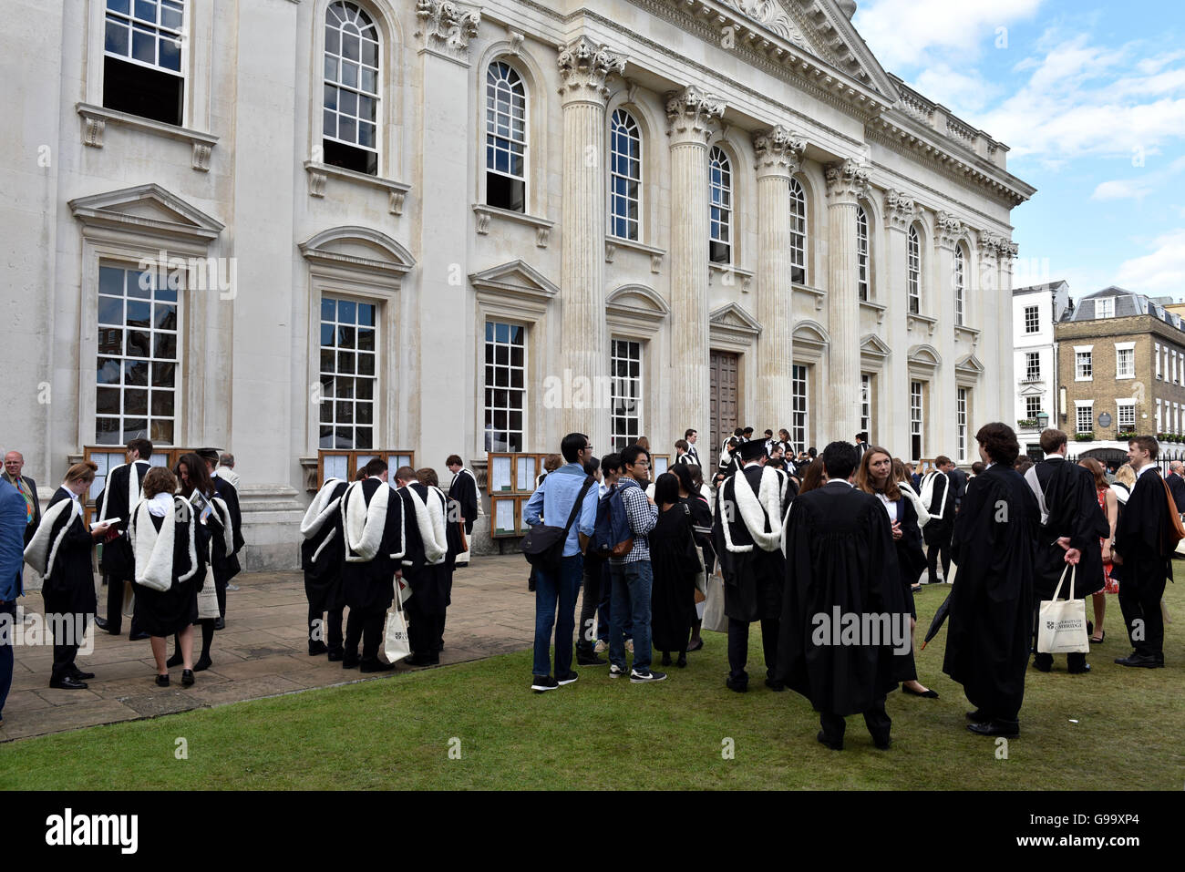 Cambridge University students celebrate on the lawn of the Senate House ...