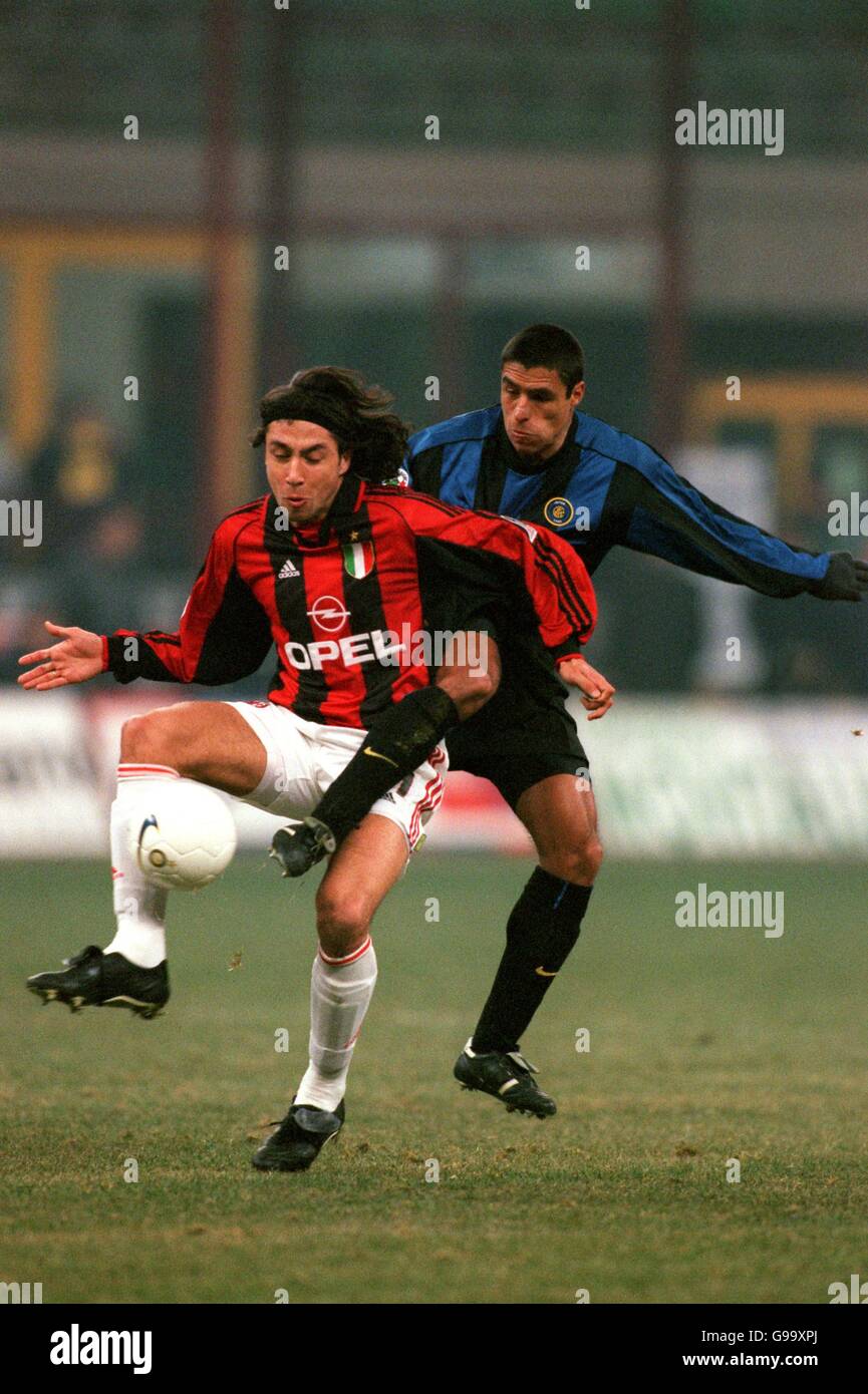 Inter milans ivan cordoba shields the ball from ac milans hi-res stock ...