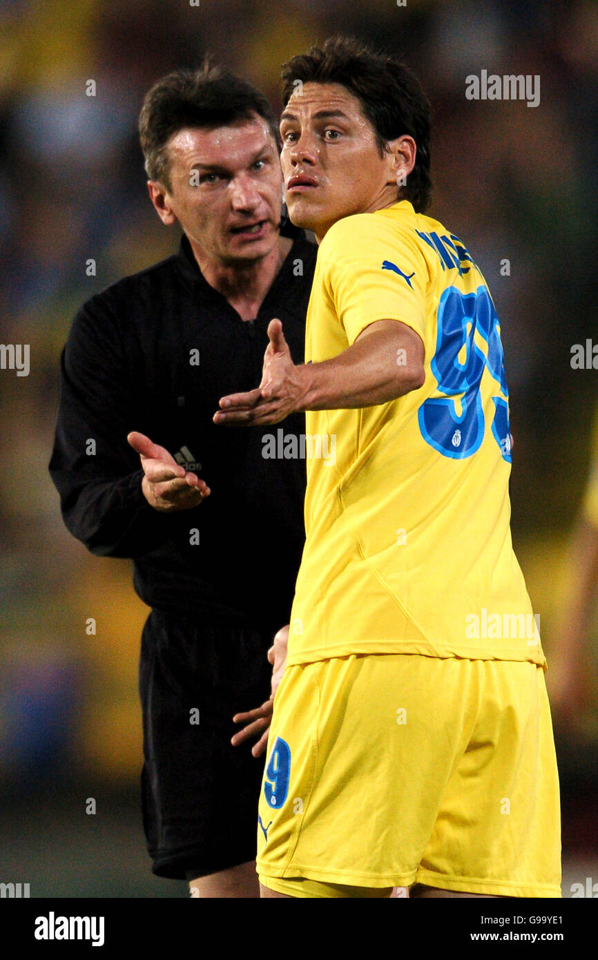 Referee valentin ivanov has words with villarreals guillermo franco hi ...