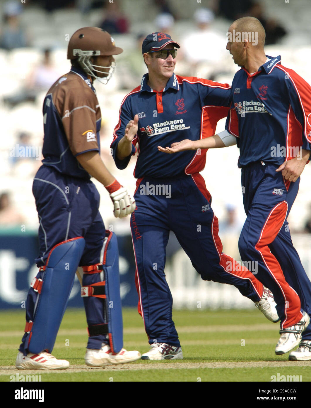 Somerset's Charl Willoughby and Keith Parsons clelbrates the wicket of ...