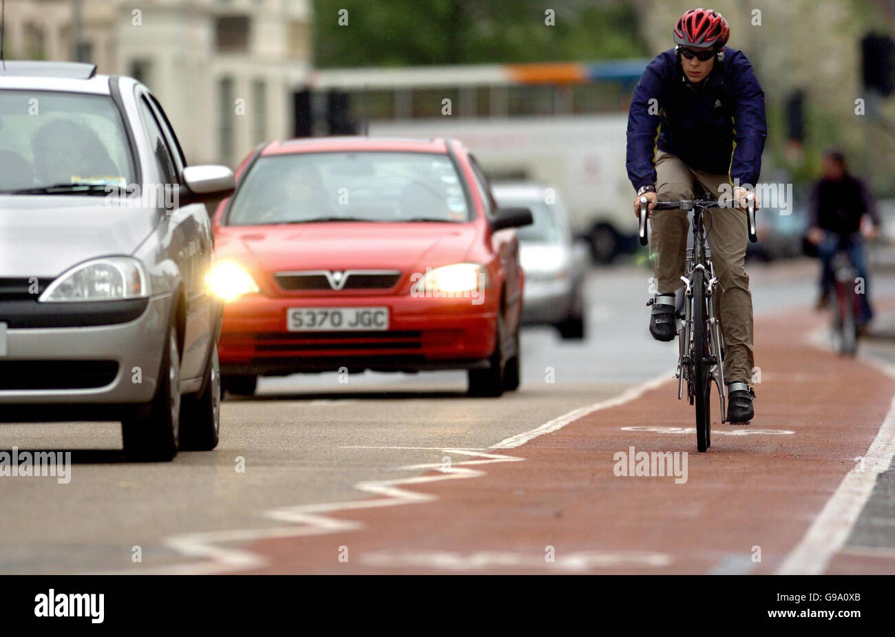 Traffic alongside cycle lane hi-res stock photography and images - Alamy