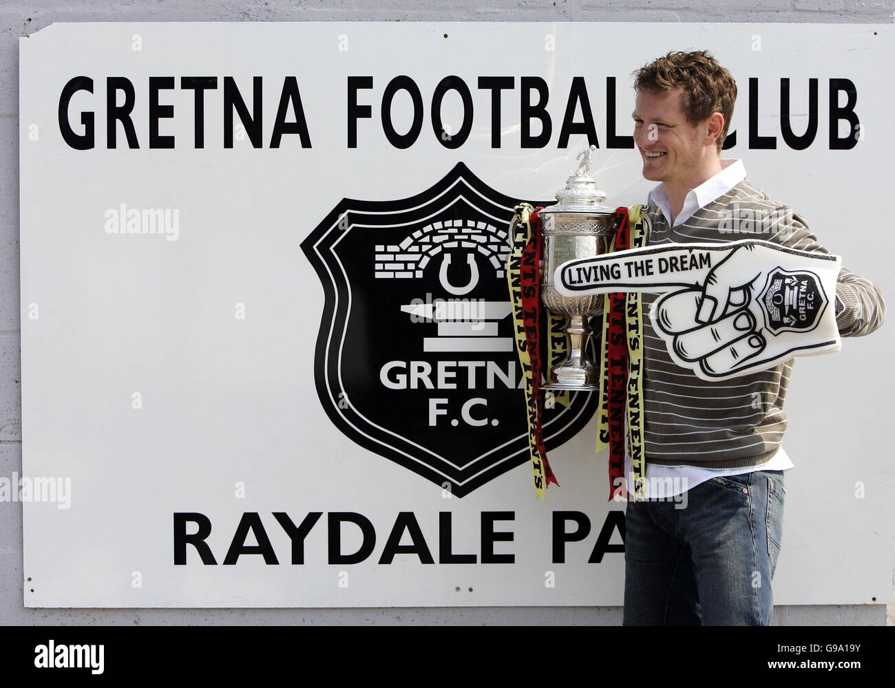 Gretna player James Grady poses for photographers during a press day at ...