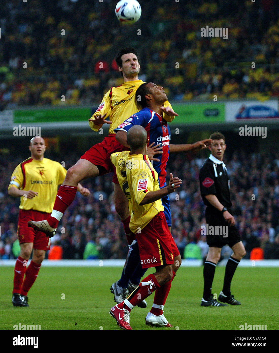 Watford's Matthew Spring wins the ball from Crystal Palace's Mikele ...