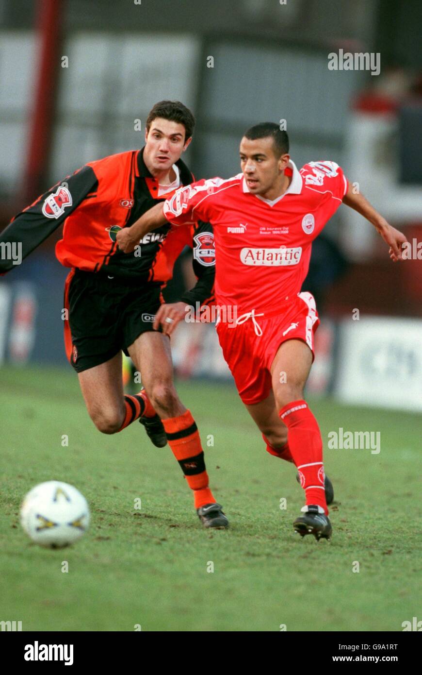 Aberdeens rachid belabed takes on dundee uniteds anastasios venetis hi-res stock photography and ...