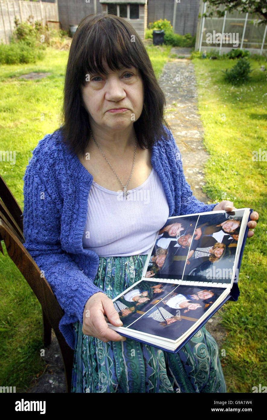 Verna Bryant, mother of Naomi Bryant, looks through an album of family ...