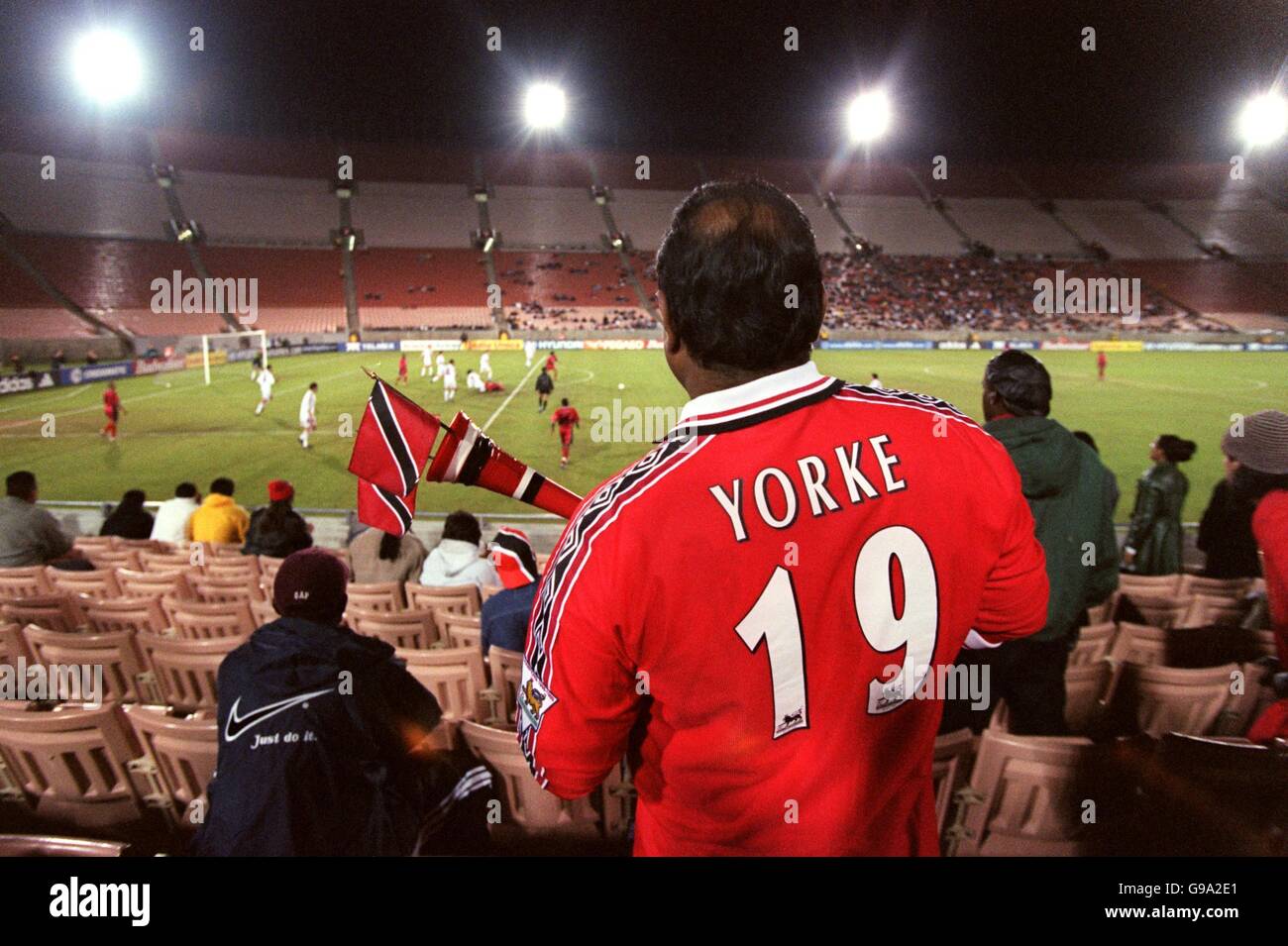 A Trinidad and Tobago fan wearing a Dwight Yorke Manchester United ...