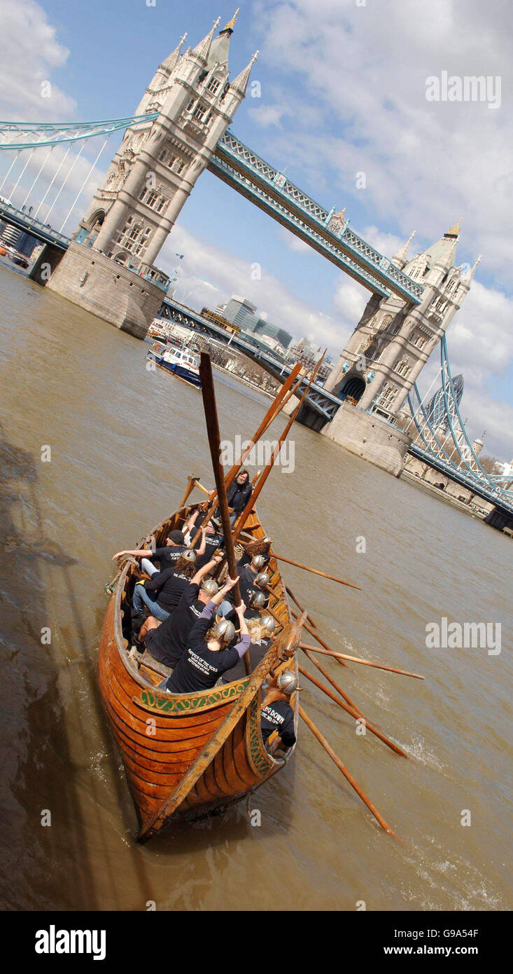 An authentic full-size replica Viking longboat makes its way down the ...