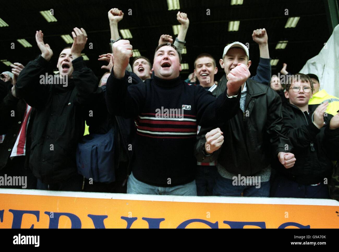 Brentford fans celebrate at the end of the match, after their team came ...
