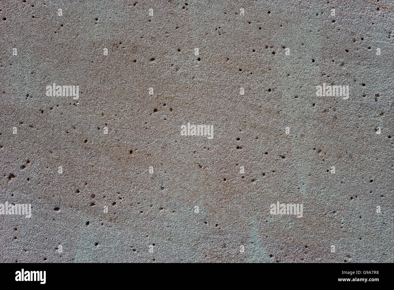 Light-colored sandstone with small holes as wallpaper Stock Photo - Alamy