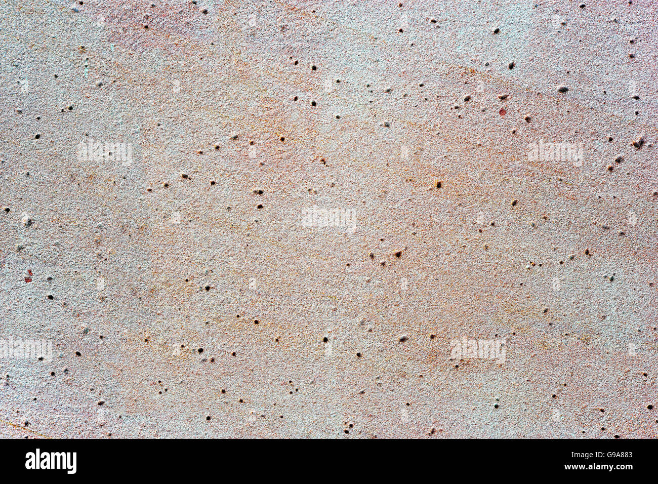 Light-colored sandstone with small holes as wallpaper Stock Photo - Alamy