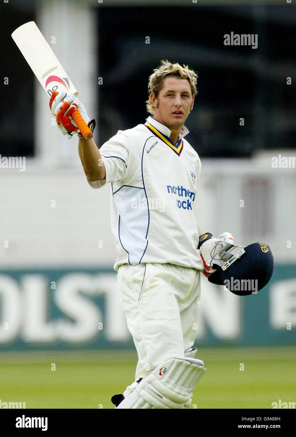 Durham's Phil Mustard celebrates scoring a century during the second ...