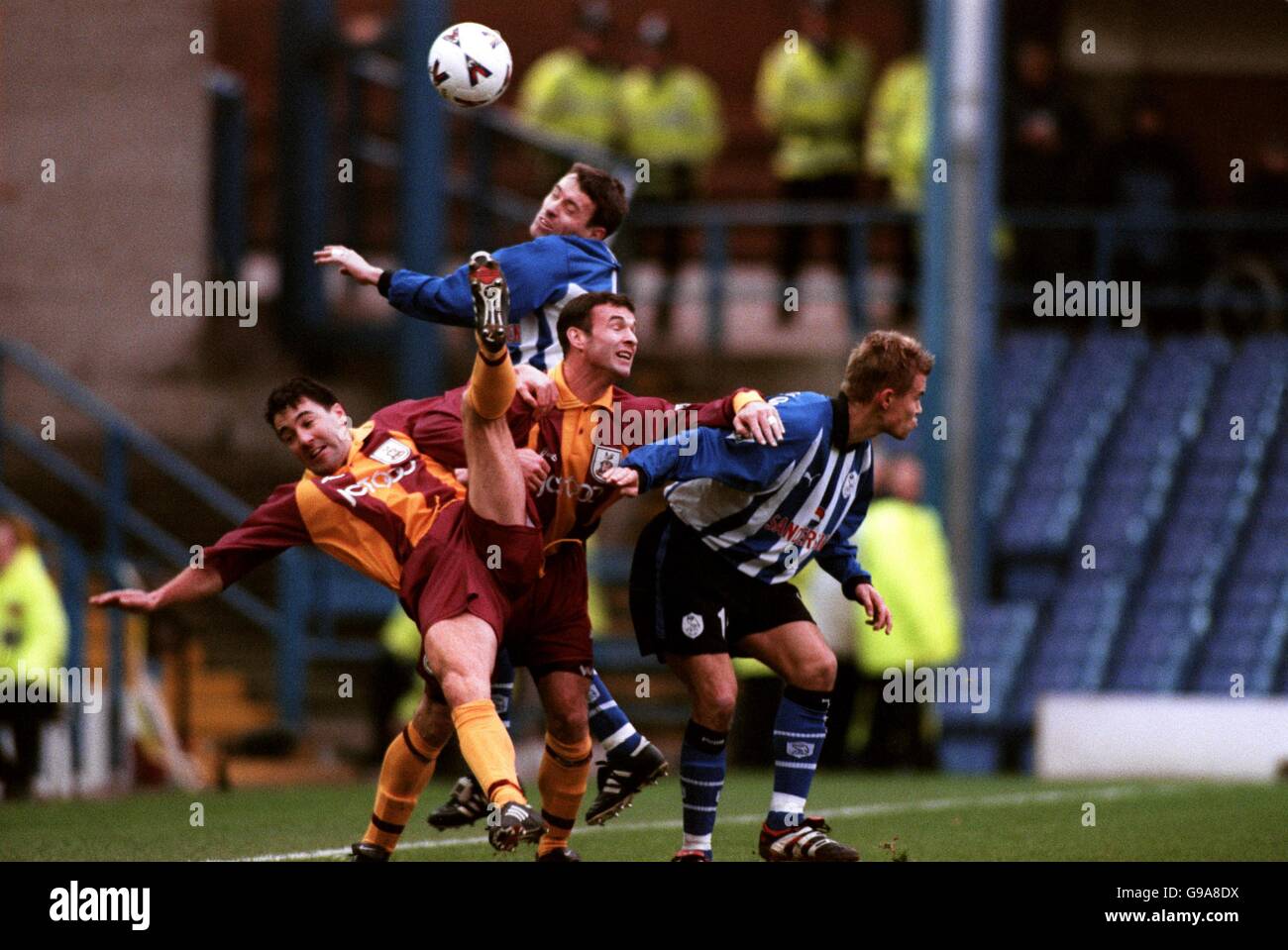 Basement battle. Bradford City's Dean Saunders and Peter Beagrie are ...