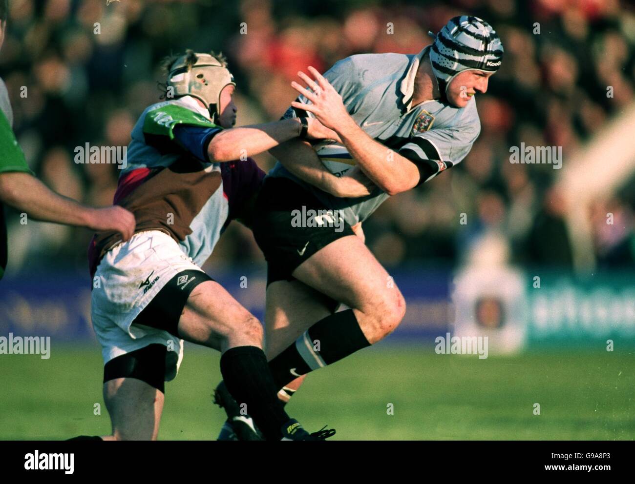 Rugby Union - European Cup - Pool Five - Harlequins v Cardiff. Cardiff's John Tait is tackled by ...
