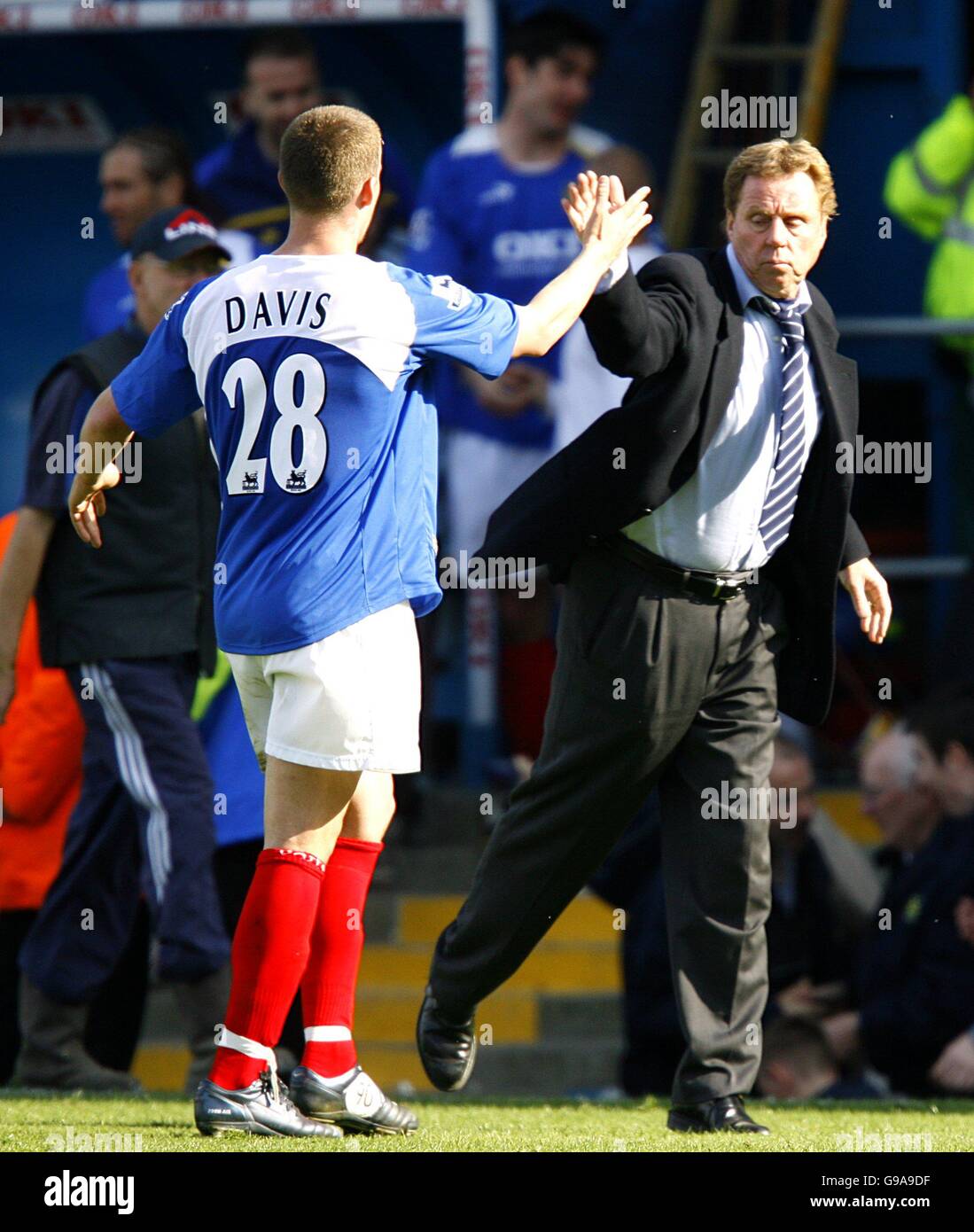 (L-R) Portsmouths Sean Davis celebrates with his manager Harry Redknapp ...