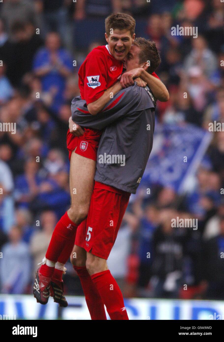Liverpool's Steven Gerrard celebrates at the final whistle with Peter ...