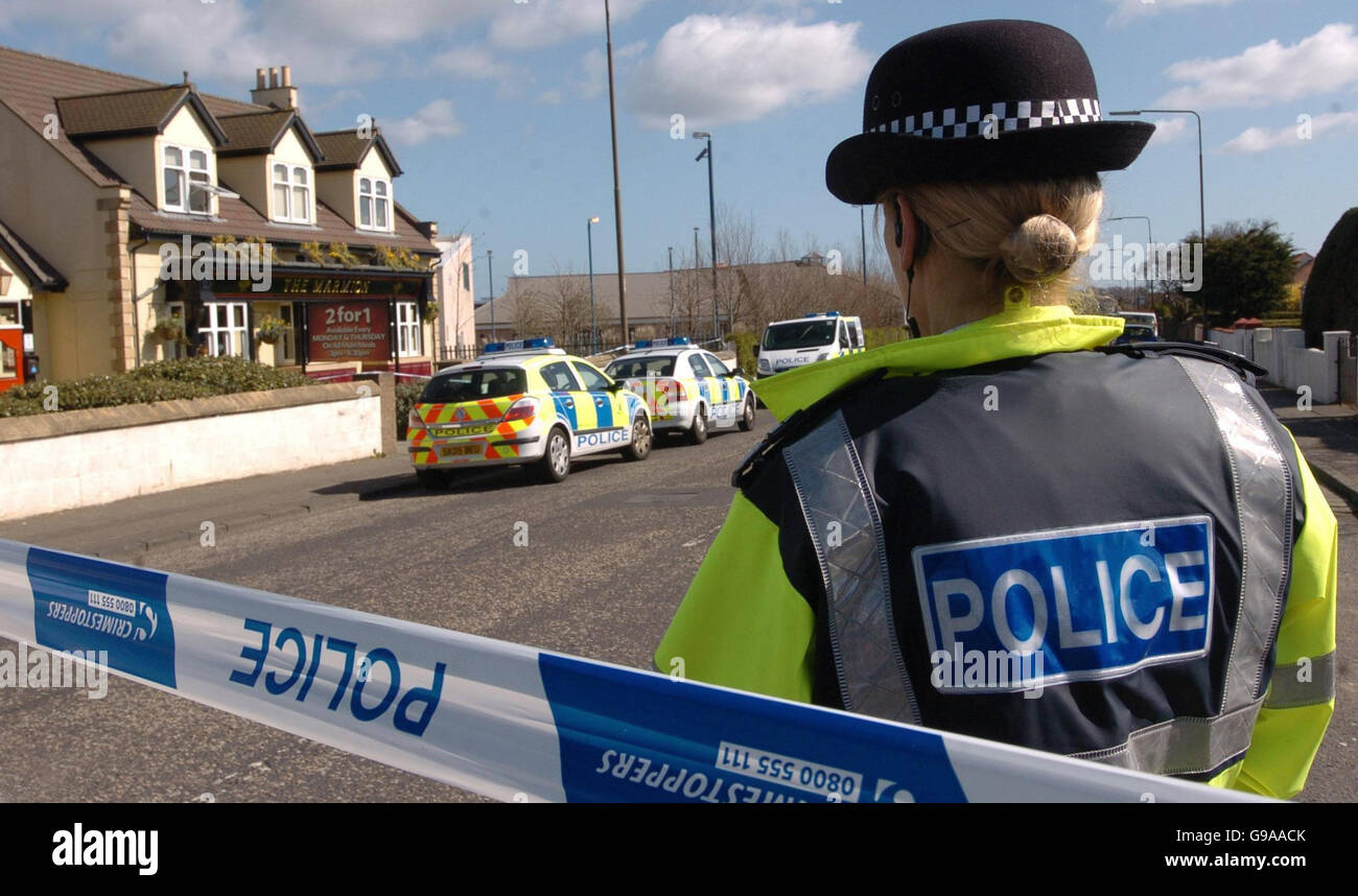 Police stand outside the Marmion pub in Edinburgh, the scene of a ...