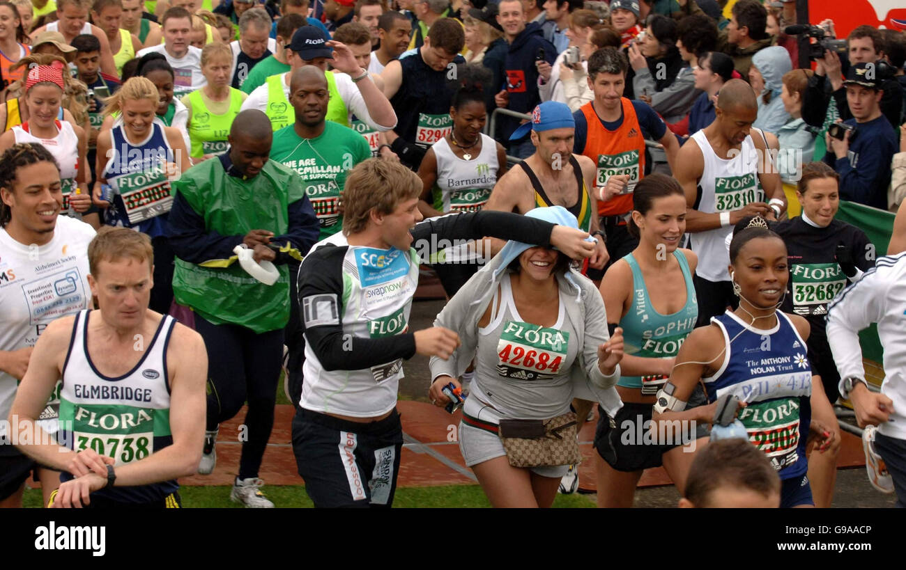Jeff Brazier pulls the hood on Jade Goody's coat at the celebrity start ...