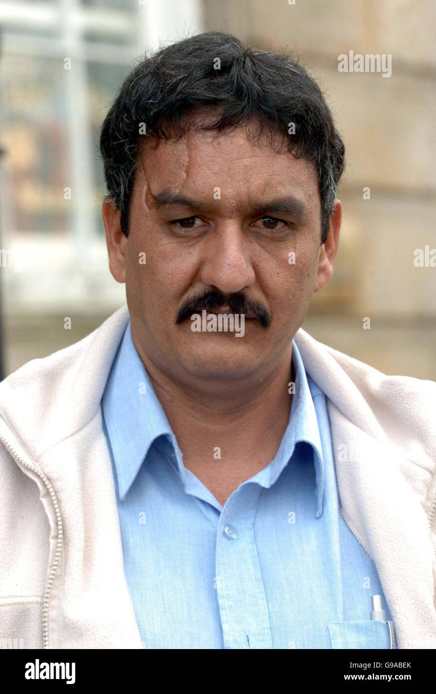 Mohammed Rafiq, 40, stands in Glasgow after being released without ...
