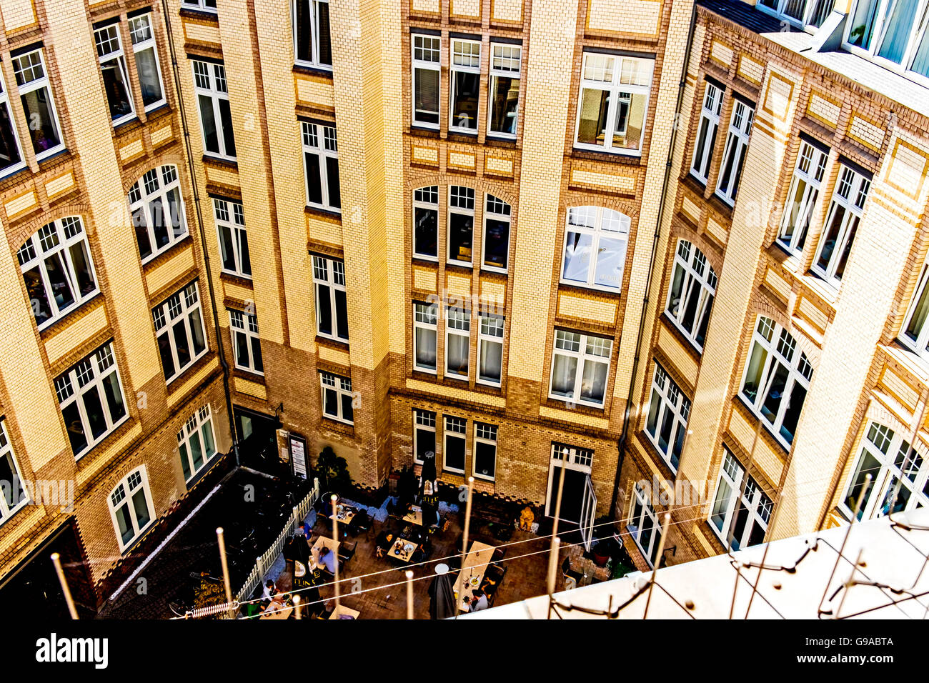 Back courtyard in Berlin with restaurant; Hinterhof in Berlin mit ...