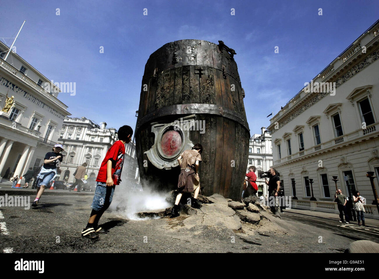 Children climb over a rocket in Waterloo Place, central London. The ...