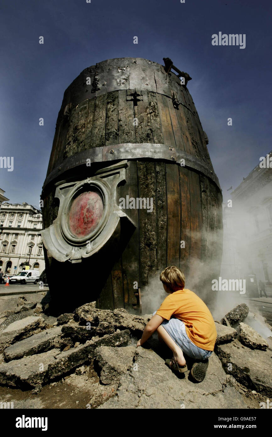 Children climb over a rocket in Waterloo Place, central London. The ...