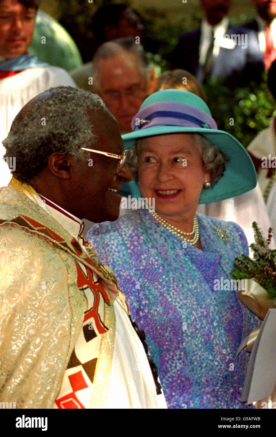 Queen Elizabeth II talks with Archbishop Desmond Tutu as she and ...