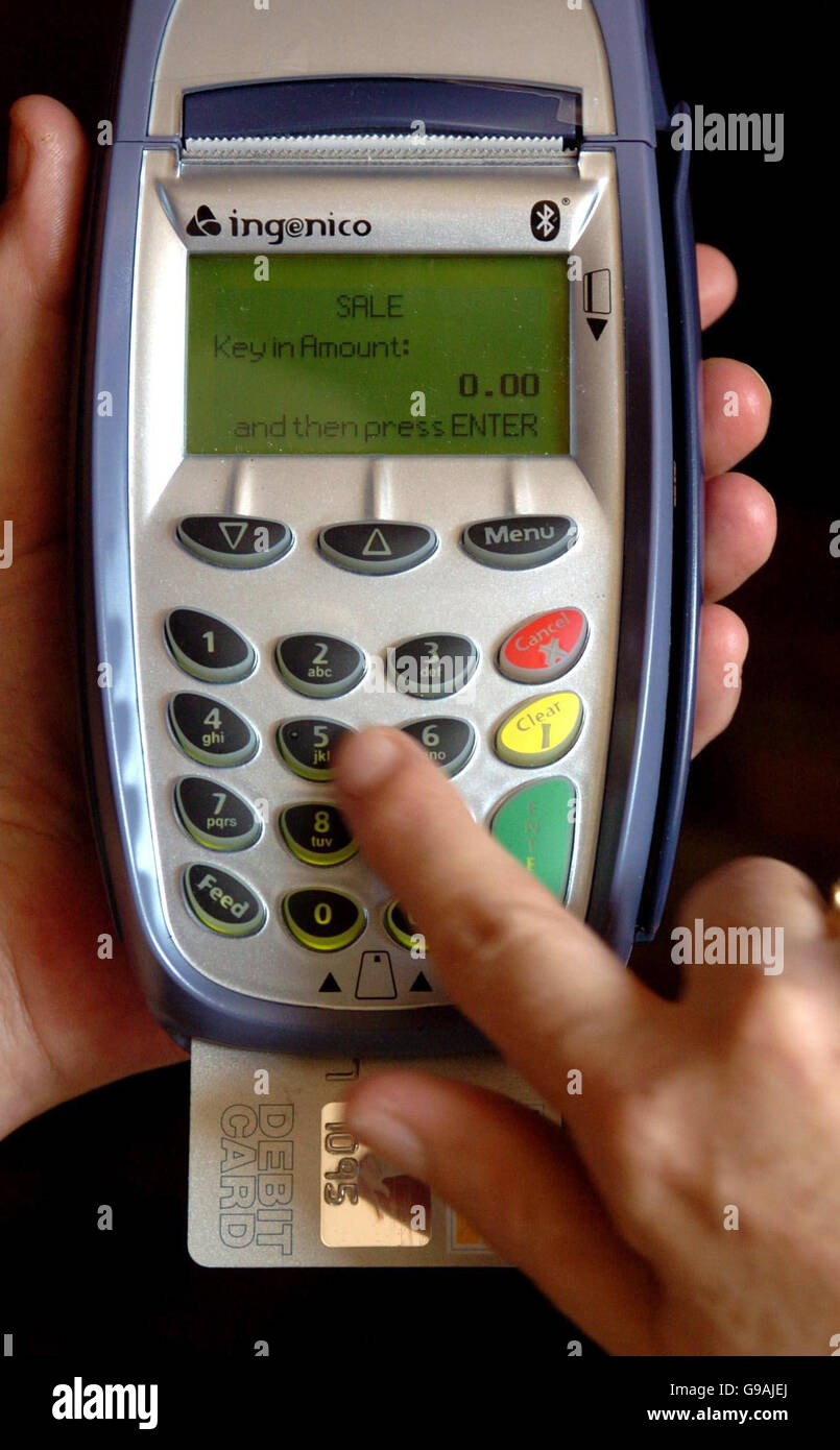 Stock photo of someone using a chip and pin machine. Stock photo of ...