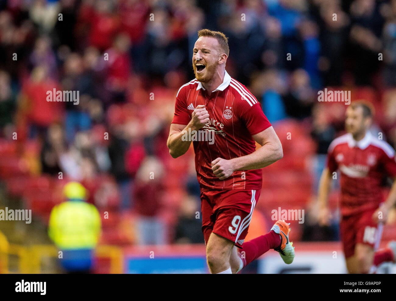 Aberdeen's Adam Rooney celebrates after scoring his sides third goal ...