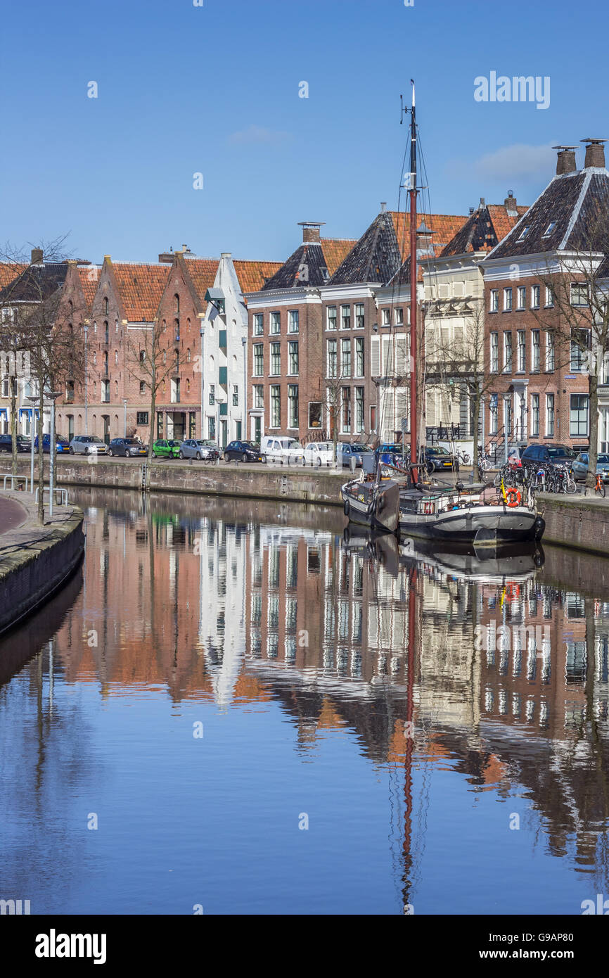 Old ship and warehouses along a canal in Groningen, Netherlands Stock ...