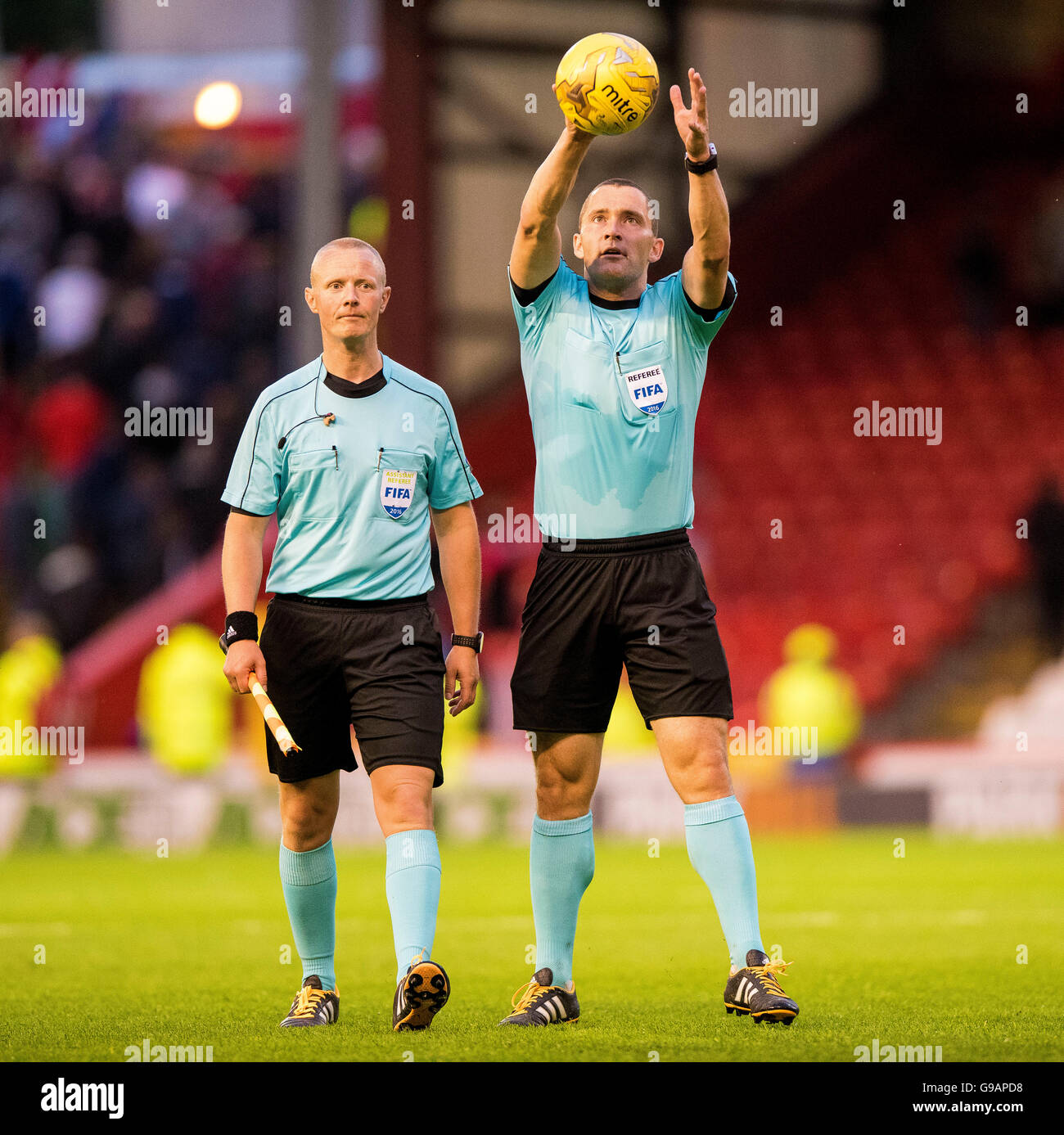 Referee Mads-Kristoffer Kristofferson and assistant Dennis W Rasmussen ...