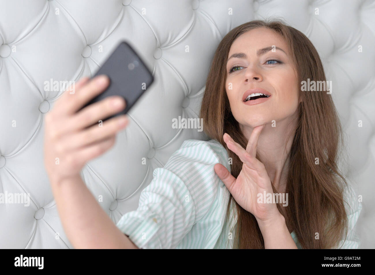 Pretty girl taking selfie Stock Photo - Alamy
