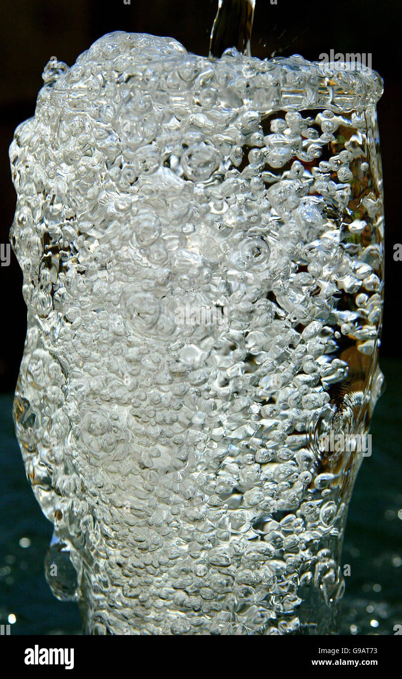 Glass being filled water in hi-res stock photography and images - Alamy