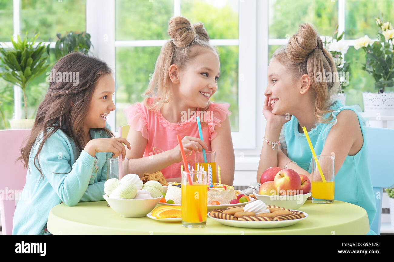 children with cake at birthday party Stock Photo - Alamy
