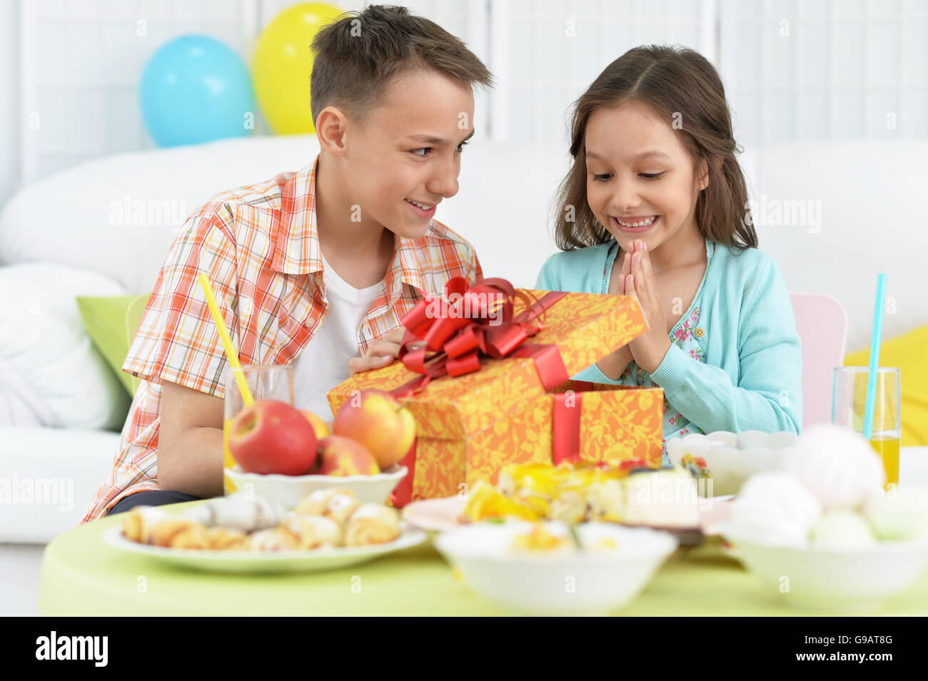Happy children with cake Stock Photo - Alamy