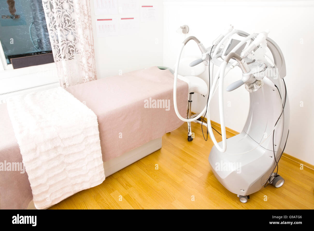 Body shaping clinic room with advanced equipment Stock Photo - Alamy