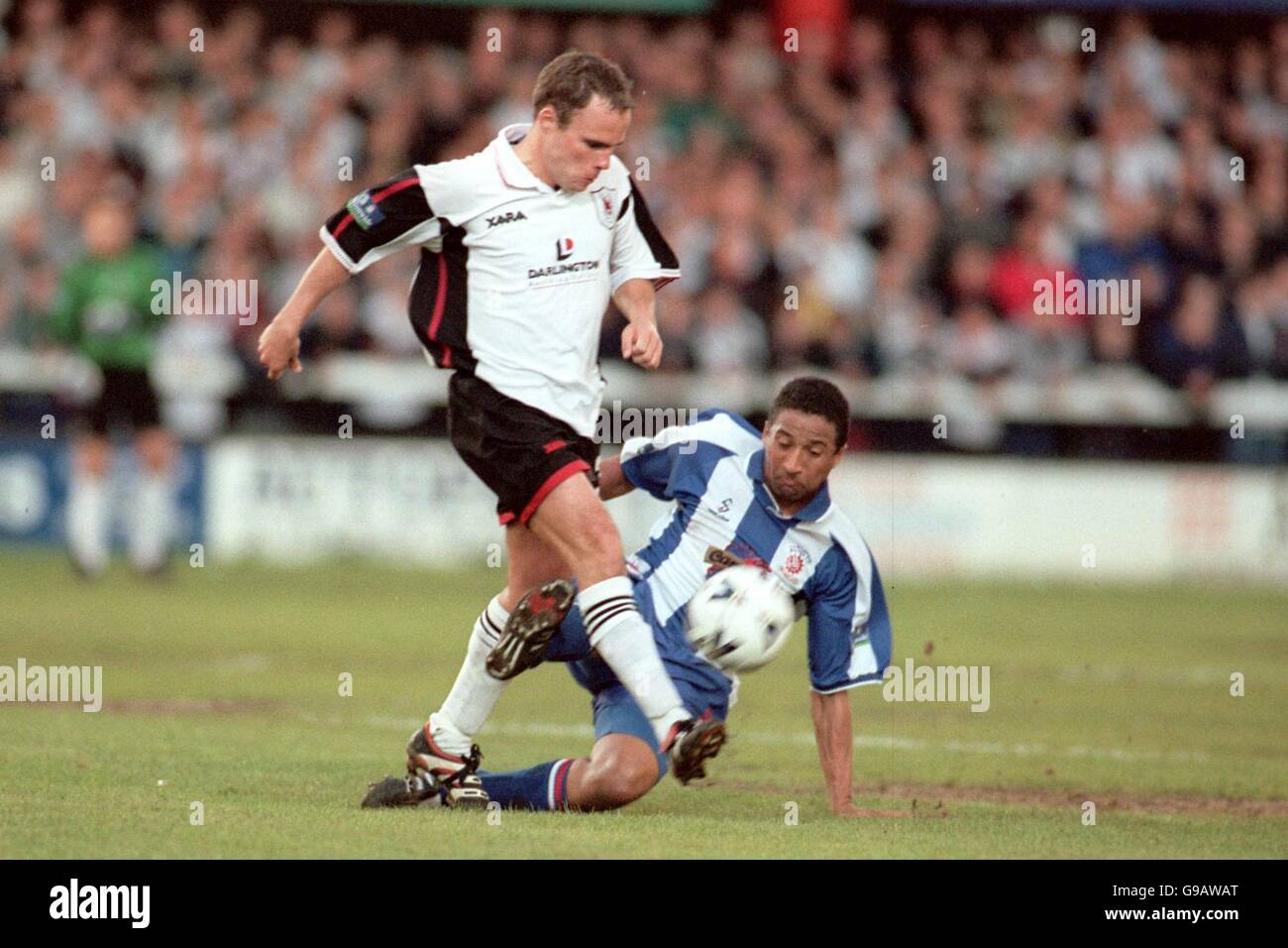Darlington's Phil Brumwell (l) and Hartlepool United's Chris Freestone ...