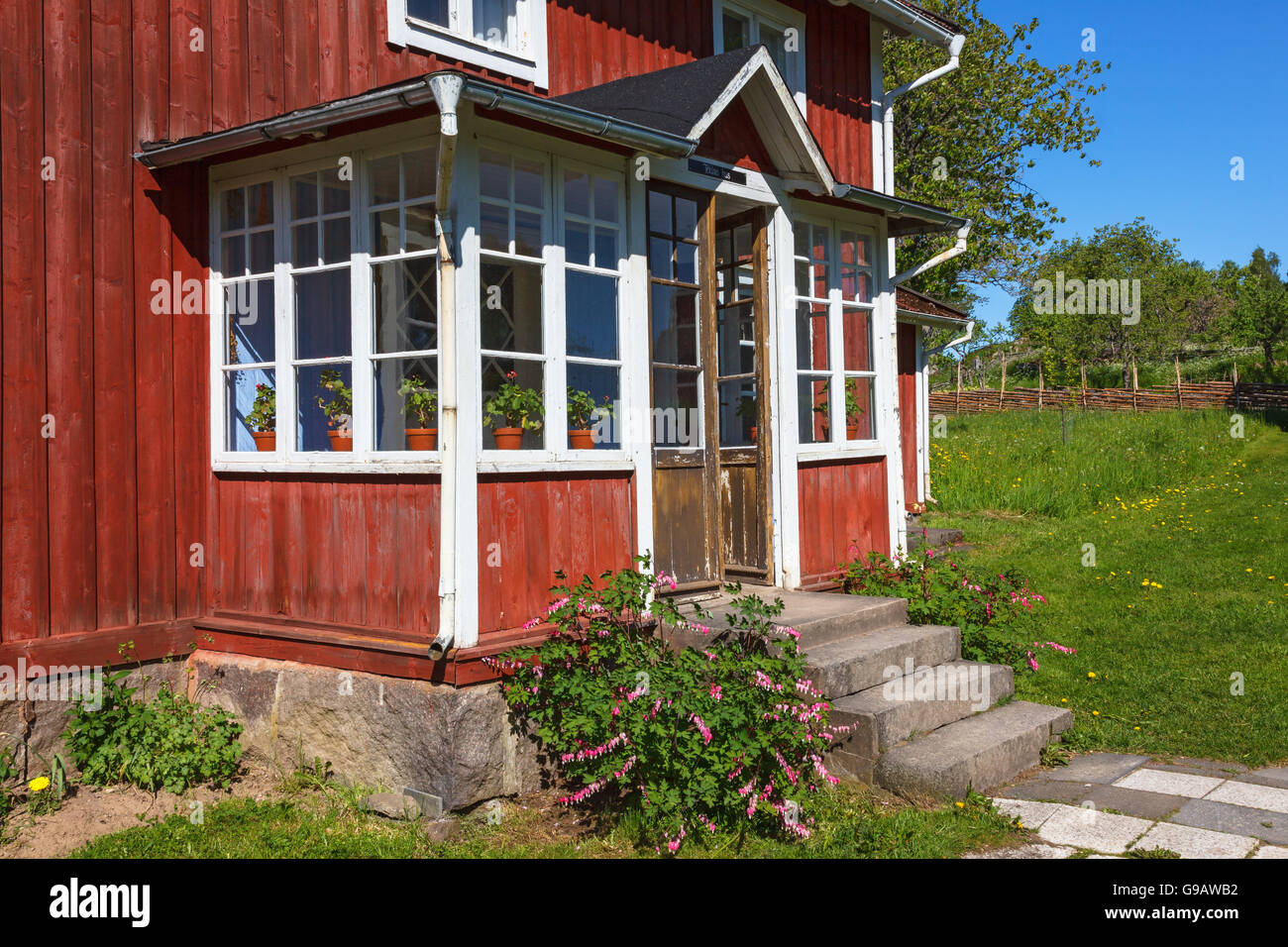 Porch on red cottage hi-res stock photography and images - Alamy