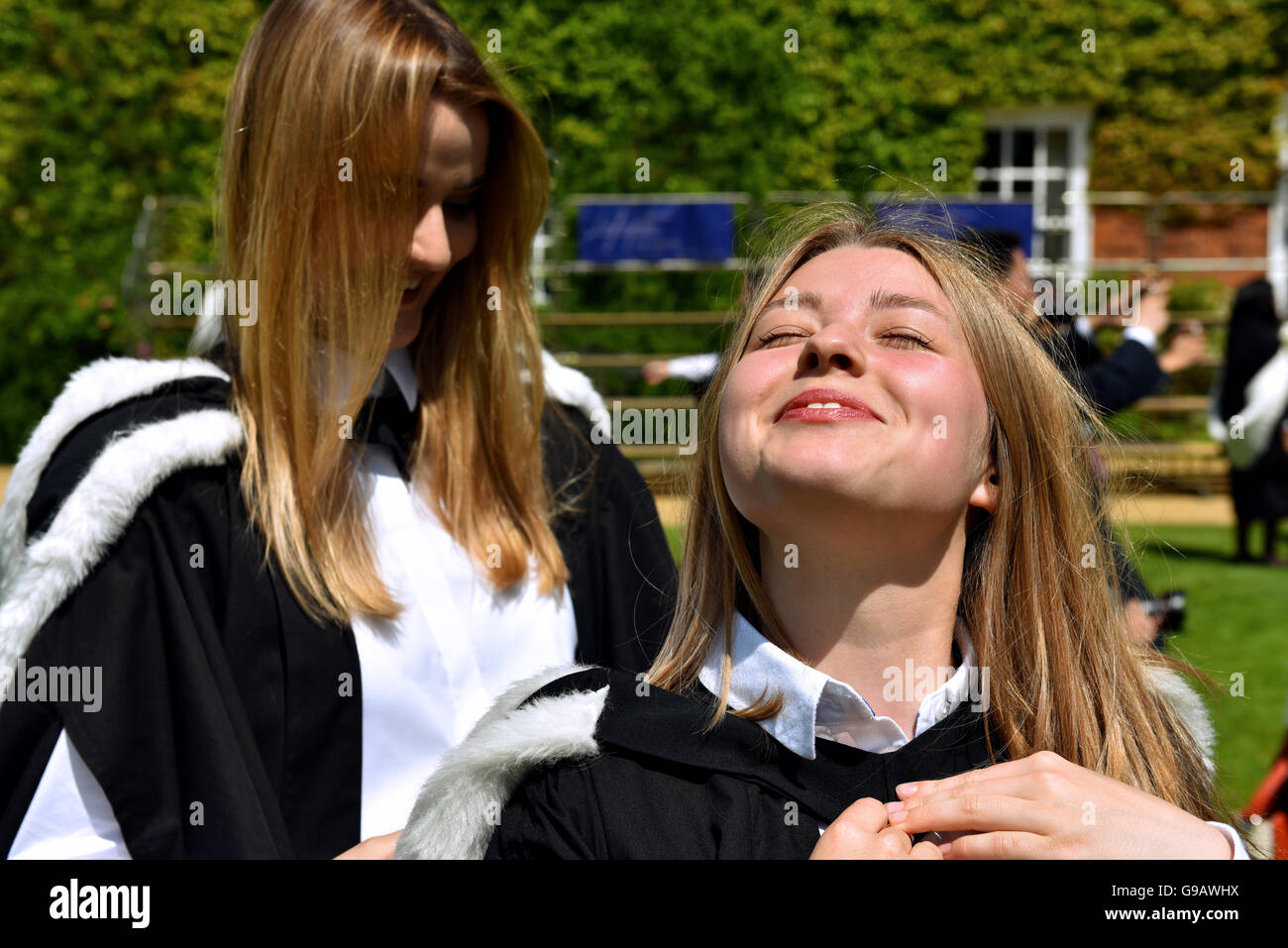 Smiling student celebrates her graduation at Cambridge University ...