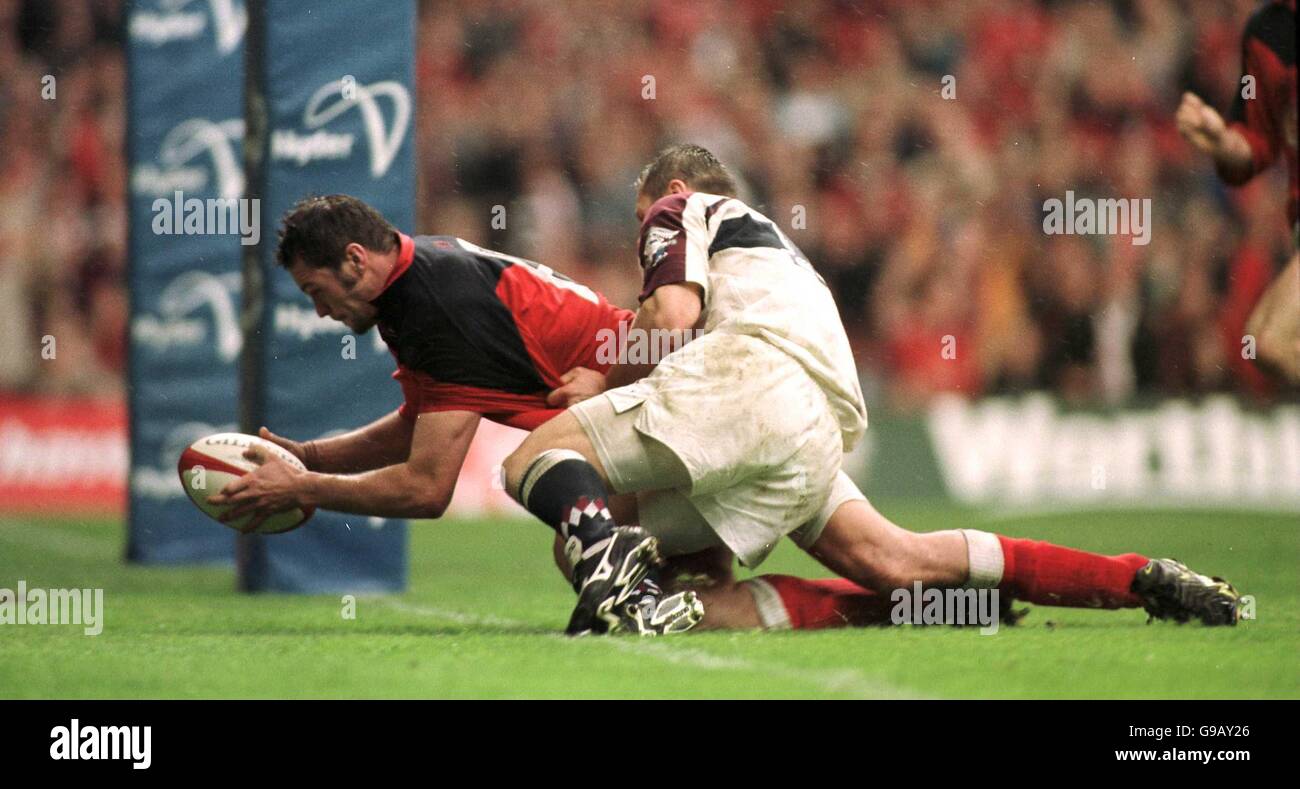 Llanelli's Craig Gillies goes over the line to score the winning try as ...