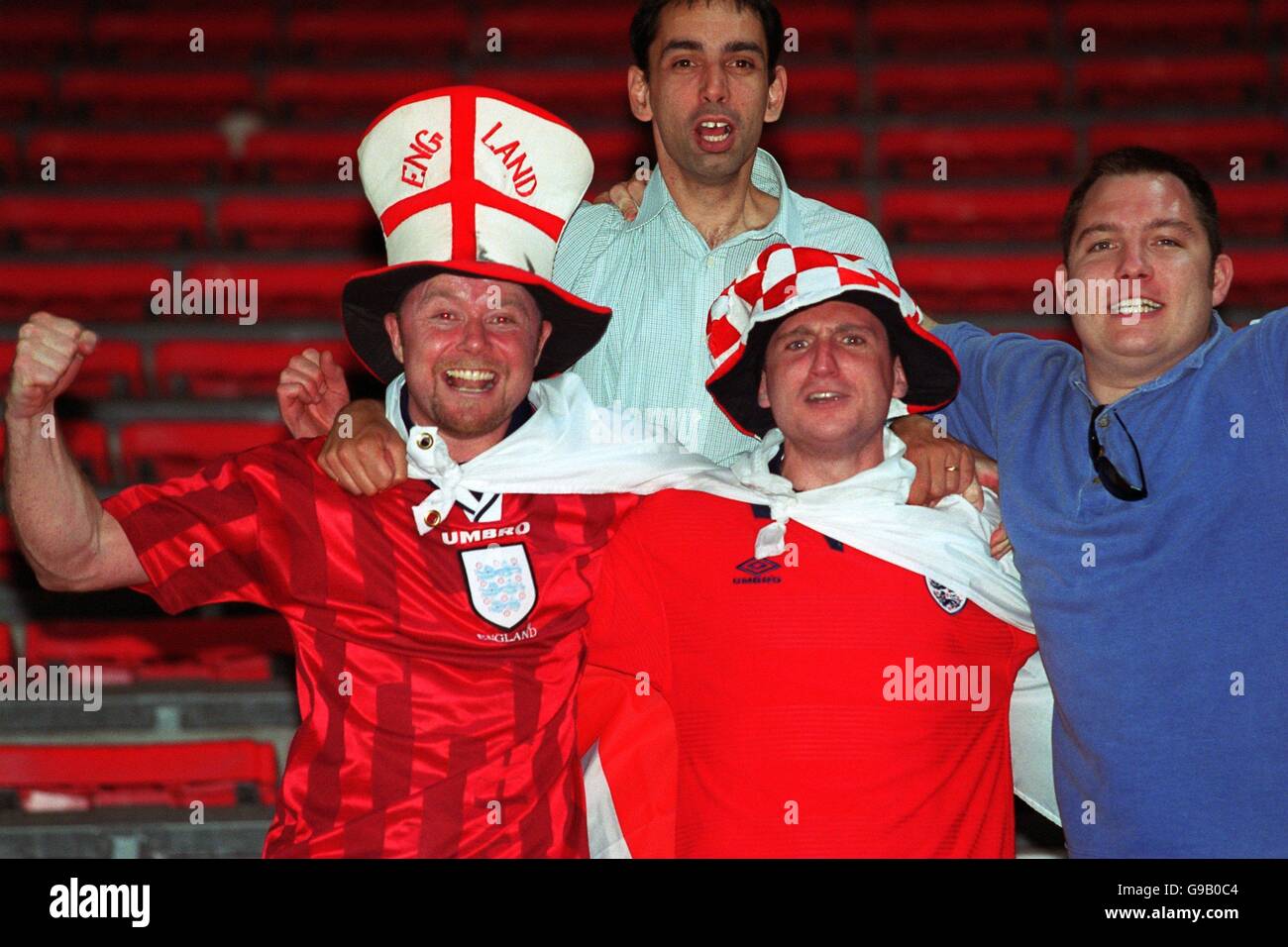 Celebration jubilant hat arms around shoulders football hi-res stock ...