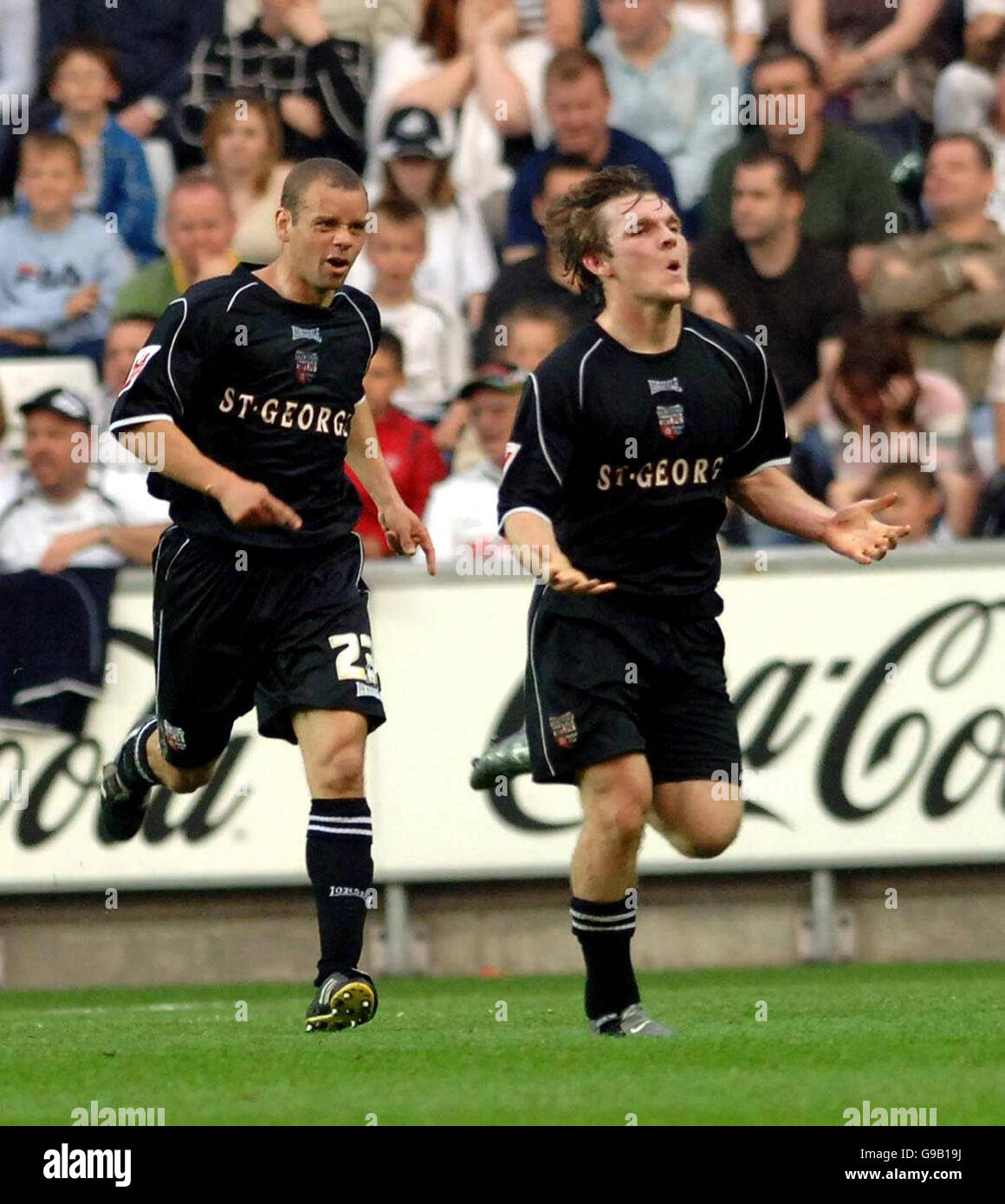 Brentford's Jay Tabb (R) celebrates his first half goal against Swansea ...