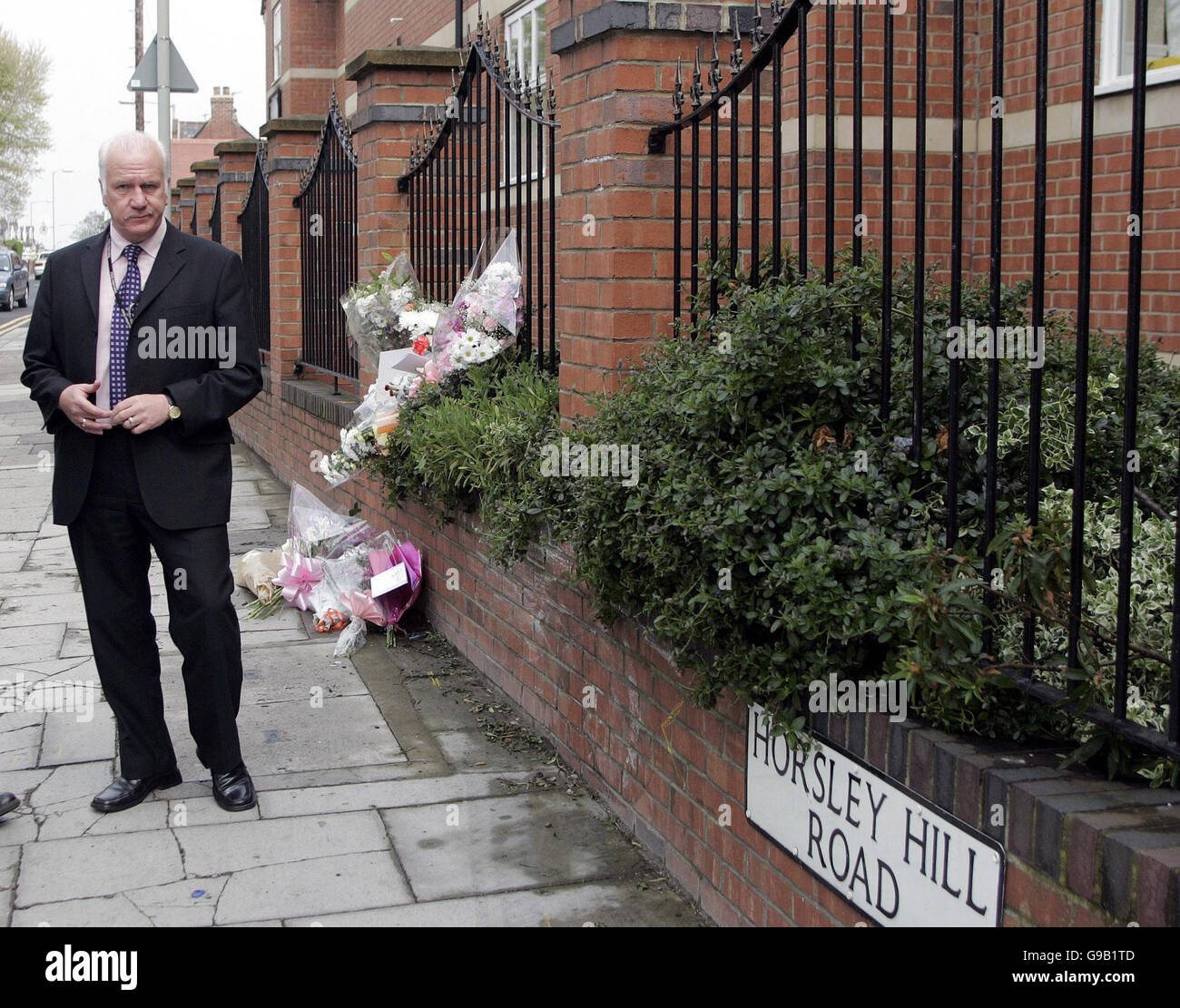 Durham Police's Superintendant Harry Stephenson stands by the floral ...