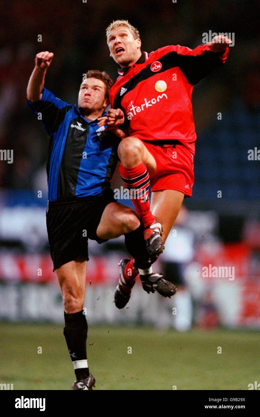 Nurnbergs martin driller climbs above waldhof mannheims werner protzel ...