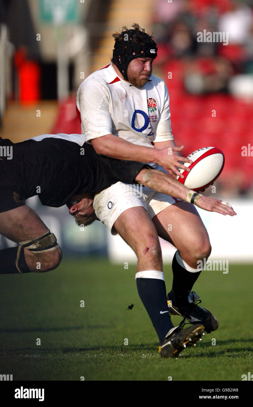 Englands mark lambert loses the ball as he is tackled hi-res stock ...