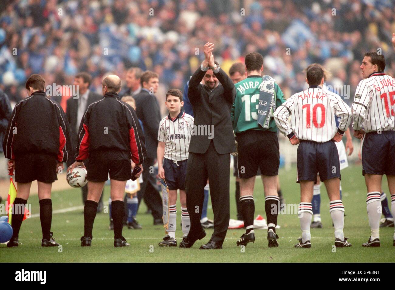 Tranmere Rovers manager John Aldridge (c) salutes his team's fans ...
