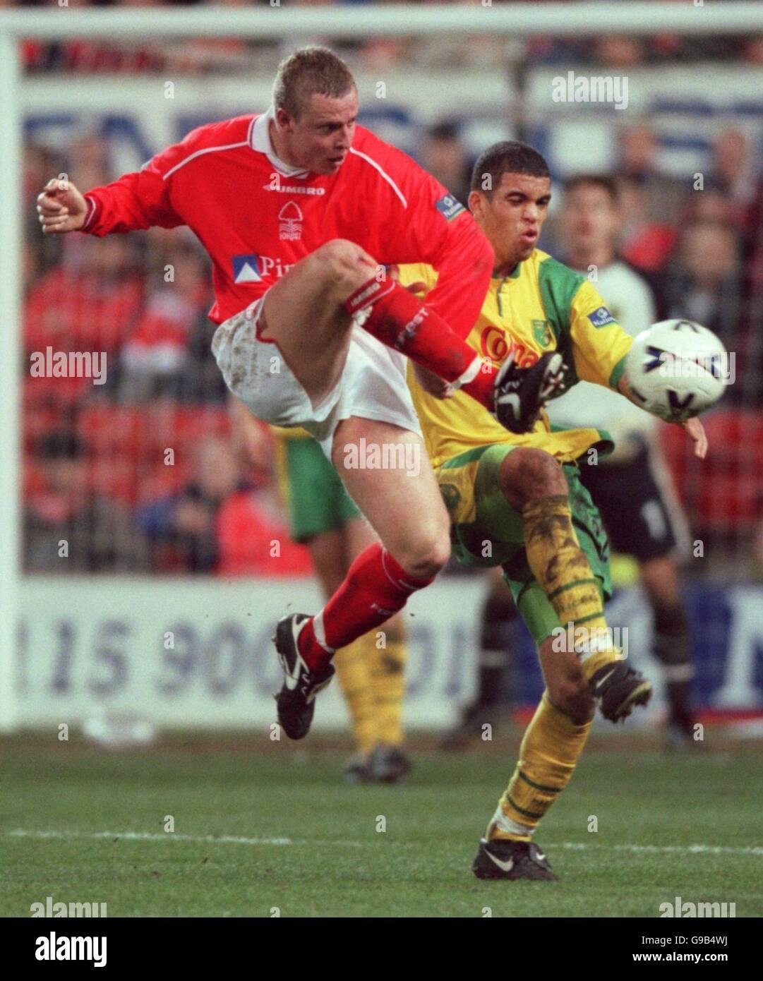 (L-R) Nottingham Forest's Tony Vaughan clears under pressure from ...