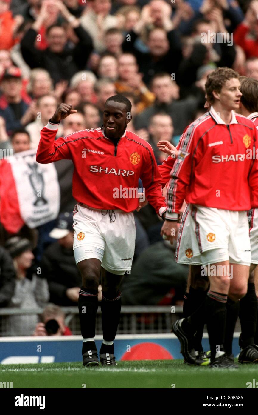 Manchester uniteds dwight yorke celebrates scoring their opening goal ...